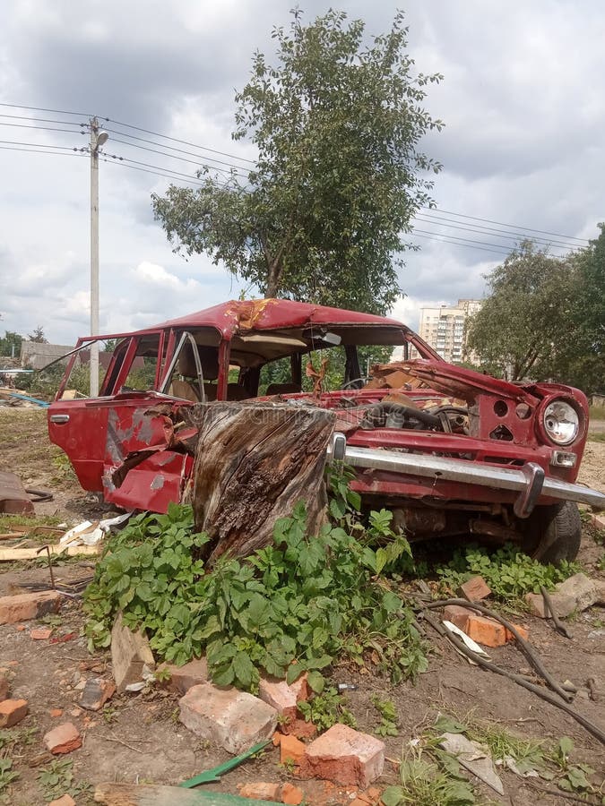 Old Broken Red Car, Crashed and Abandoned Car after an Accident Stock ...