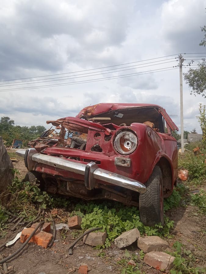 Old Broken Red Car, Crashed and Abandoned Car after an Accident Stock ...