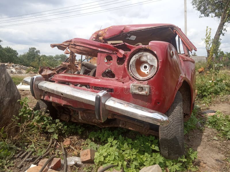 Old Broken Red Car, Crashed and Abandoned Car after an Accident Stock ...