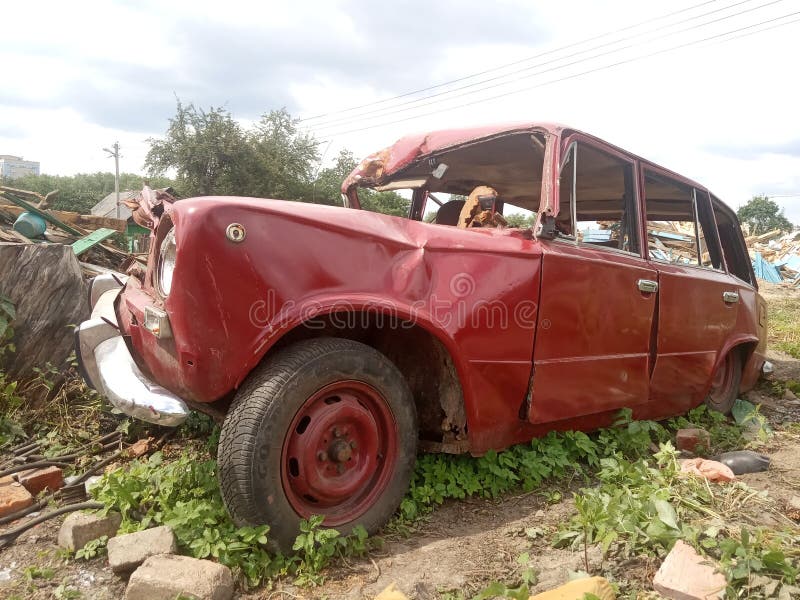 Old Broken Red Car, Crashed and Abandoned Car after an Accident Stock ...