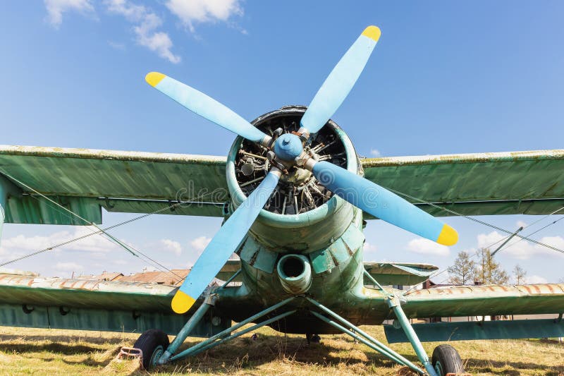 Old Russian Plane an-2 in the Meadow in the Spring Against the ...