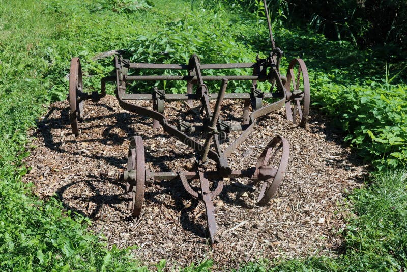 Old Broken Rusty Plow in the Backyard of a Village House Stock Photo ...