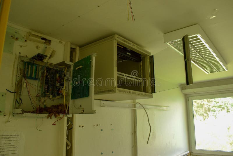 Old broken server cabinet stock photo. Image of green - 131797794