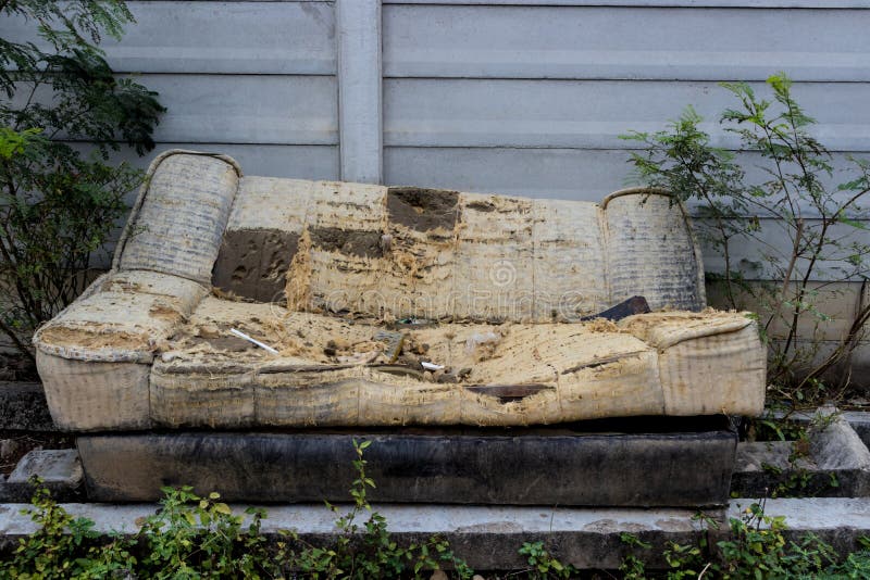 Old and Broken Sofa Left on the Side of Street Stock Photo - Image of ...