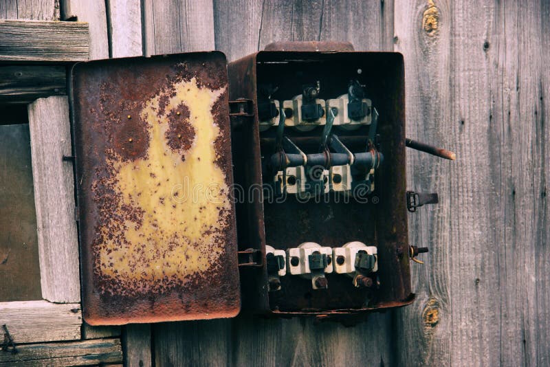 Old Broken Switchboard on a Wooden Wall .disassembled, Plundered ...
