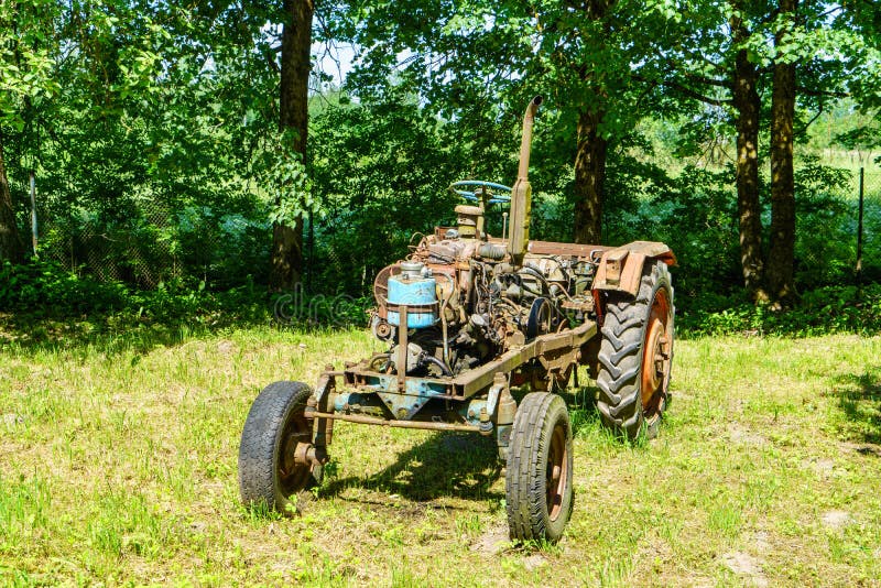 Old Broken Tractor in the Field Stock Image - Image of area, tractor ...