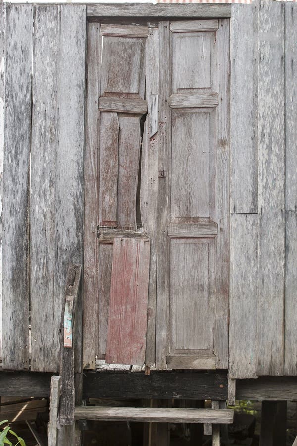 Old and broken wooden door stock photo. Image of wood - 63003488