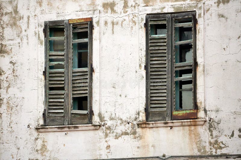 Old Broken Wooden Windows on a Dirty Wall of an Abandoned House Stock ...