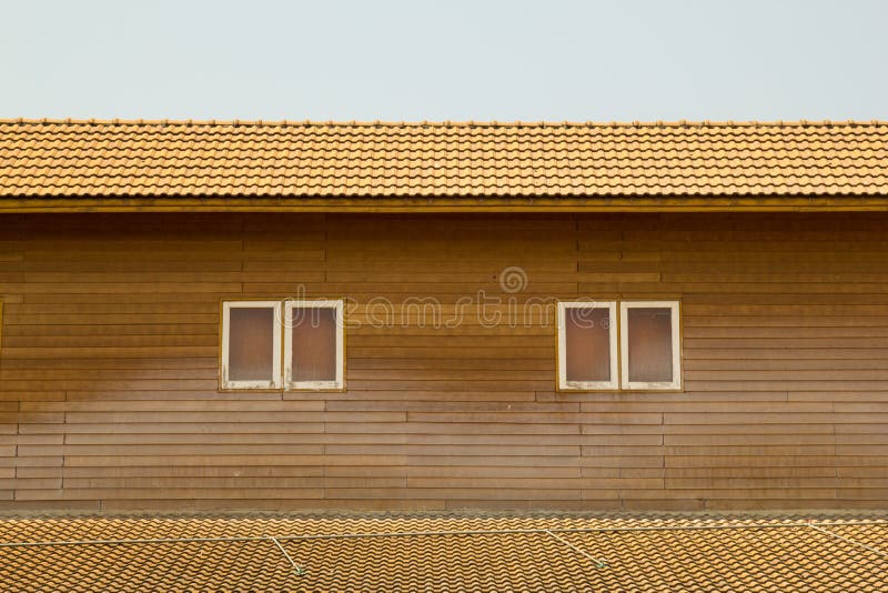Old Brown Clay Tiles Roof Pattern with Small Windows on Wood Wall Stock ...