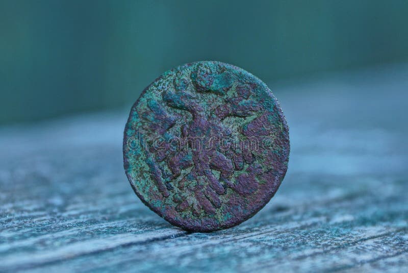Old Brown Copper Coin with an Eagle on a Gray Table Stock Photo - Image ...