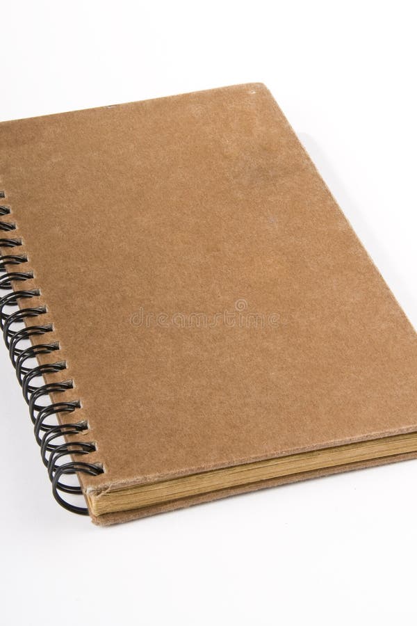Old brown spiral notebook stock image. Image of white - 4672947