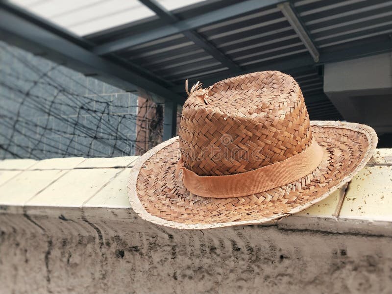 Old Brown Straw Hat on the Wall. Stock Image - Image of clothes, rural ...
