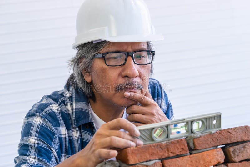Old Builder is Leveling Brick Wall Stock Image - Image of detail ...
