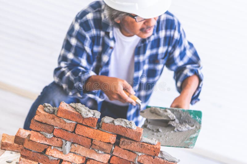 Old Builder Craftsman is Leveling Brick Wall Stock Image - Image of ...