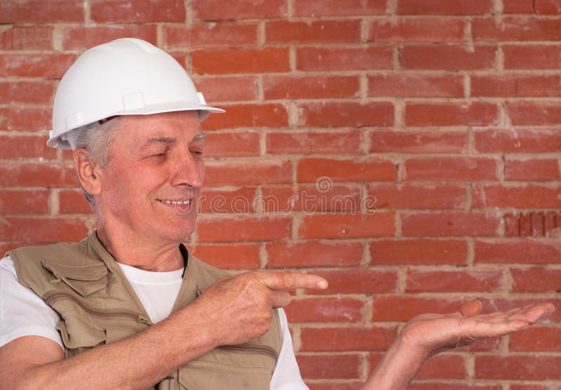 Old builder in the helmet stock image. Image of studio - 19289365