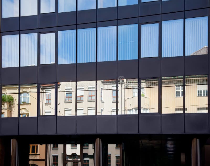 Old Building Architecture Reflected in Modern Building Stock Photo ...