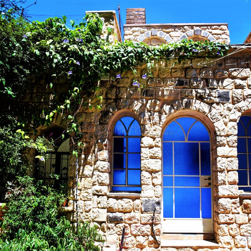 Old Building with a Blue Glass Window Stock Image - Image of property ...