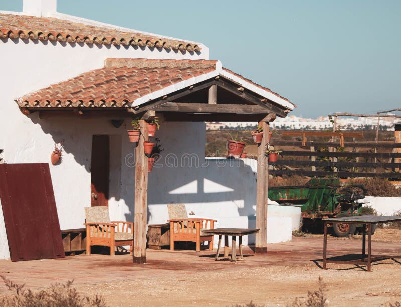 Old Building Facade with Armchairs and Table in Front Stock Photo ...