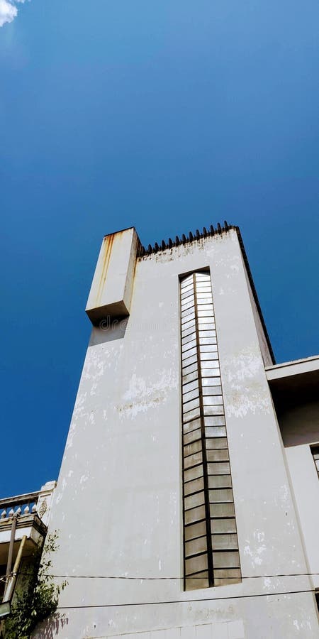 Old building grey blue sky stock photo. Image of grey - 235655630