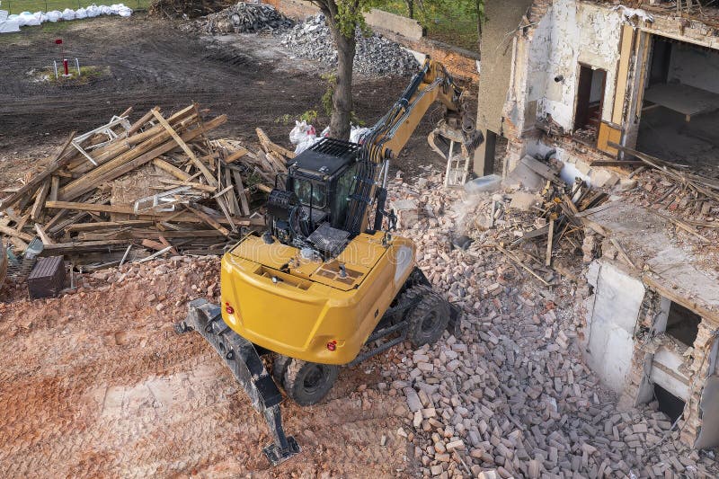 An Excavator during Demolition Work Stock Image - Image of wall ...
