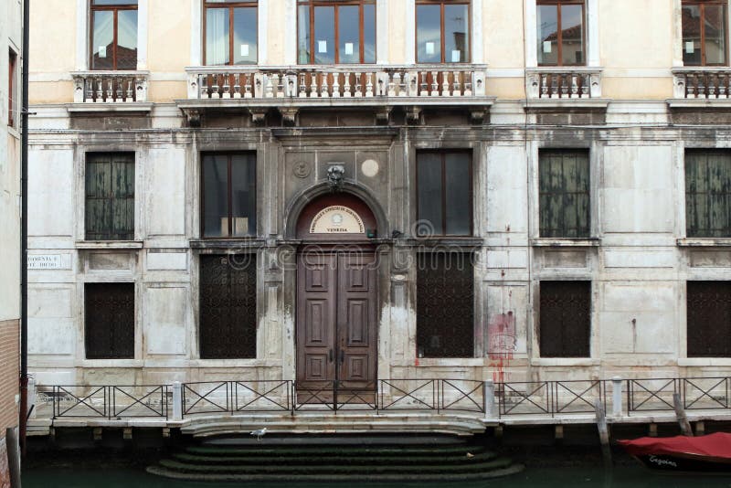 Old Building with Many Windows and a Door with Arc in Venice, Italy ... Old Building with Many Windows and a Door with Arc in Venice, Italy ...