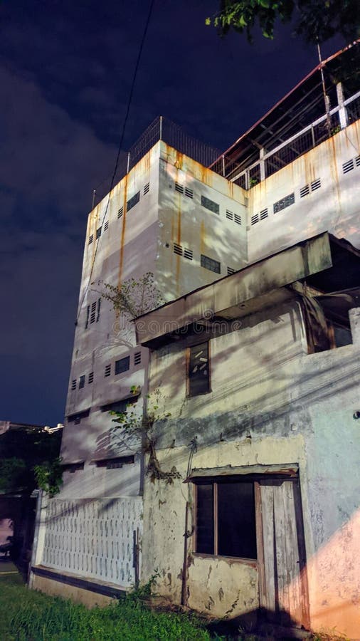 Old Building in the Middle of the Bustling City Stock Image - Image of ...