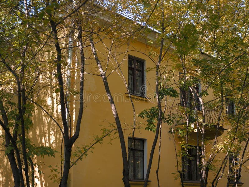 Old Yellow Building stock photo. Image of blue, city - 128030160