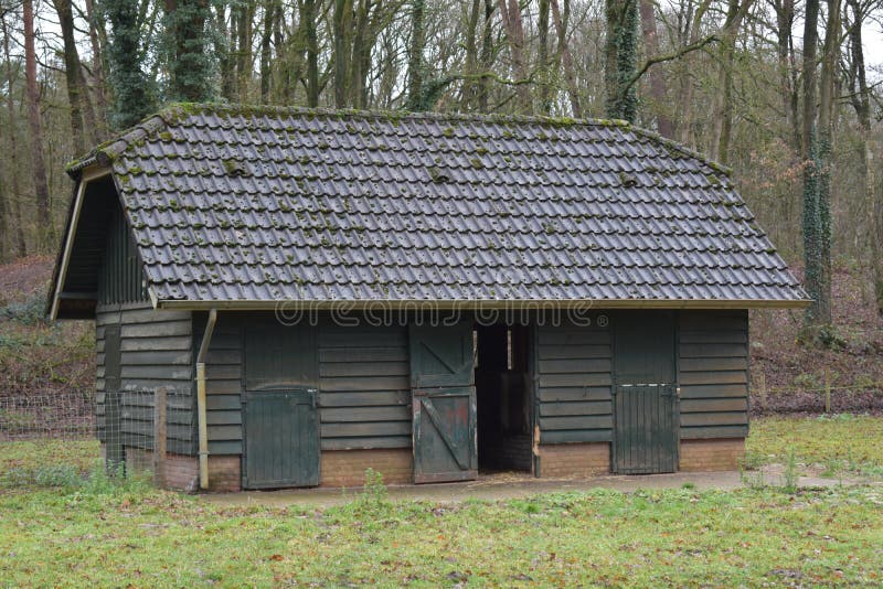 Old Building in a Petting Zoo Stock Photo - Image of trees, grass ...