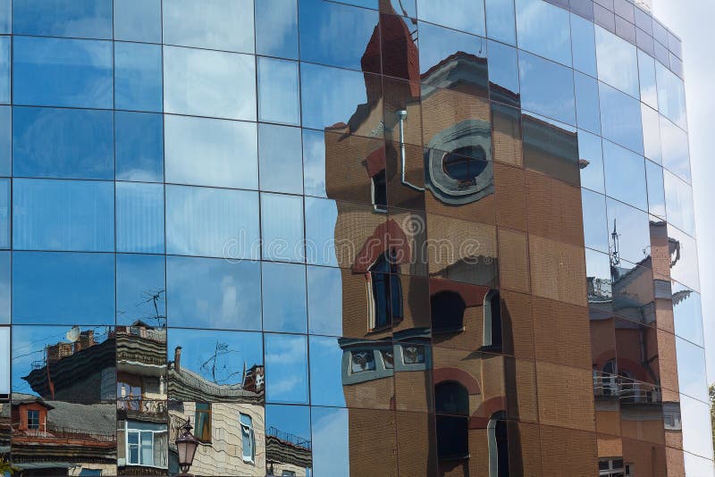 Old Building is Reflected in the Windows of the Facade Stock Photo ...
