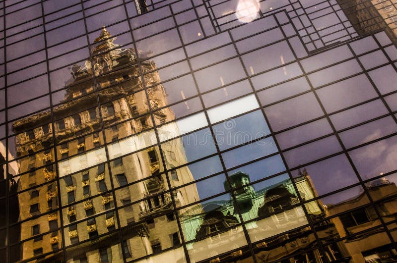 Old Building Reflection on a Highrise Building Stock Image - Image of ...