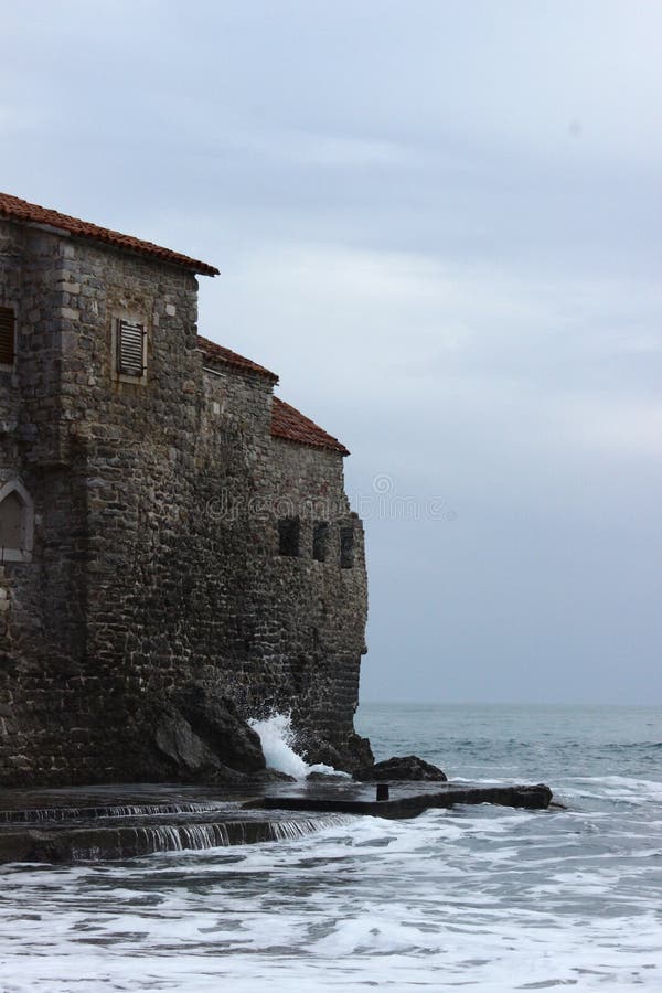 Old Buildings, Fortifications at Sea and Waves Defense Wall - Town ...