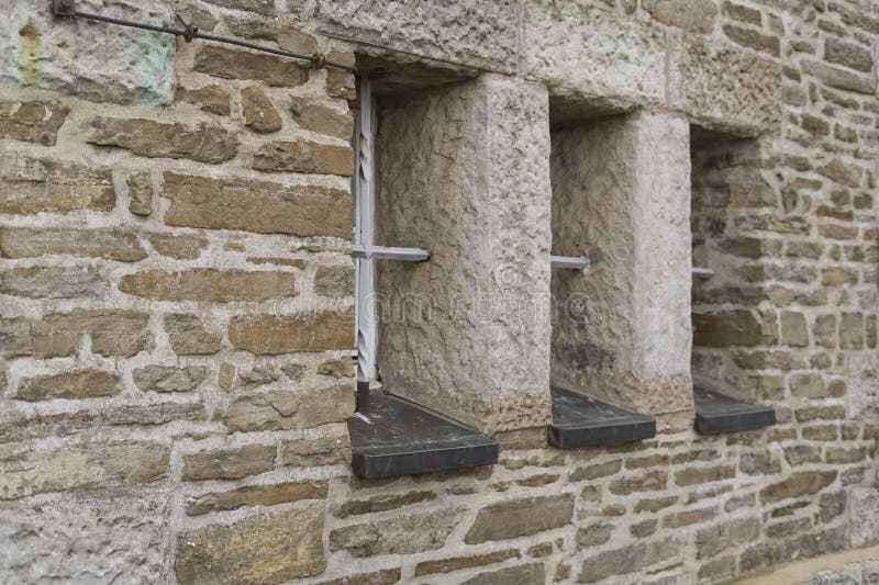 Old Building with Small Square Windows Made of Medieval Stone Stock ...