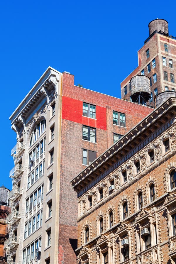 Old Buildings in Manhattan, NYC Stock Photo - Image of window, blue ...