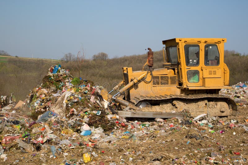 The Bulldozer on a Garbage Dump Stock Image - Image of conservation ...
