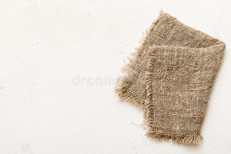 Old Burlap Fabric Napkin, Sackcloth on Table Background. Top View with ...