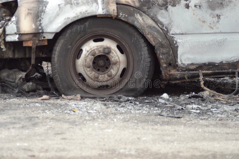 Old Burned Car with a Flat Tire during Daytime Stock Photo - Image of ...