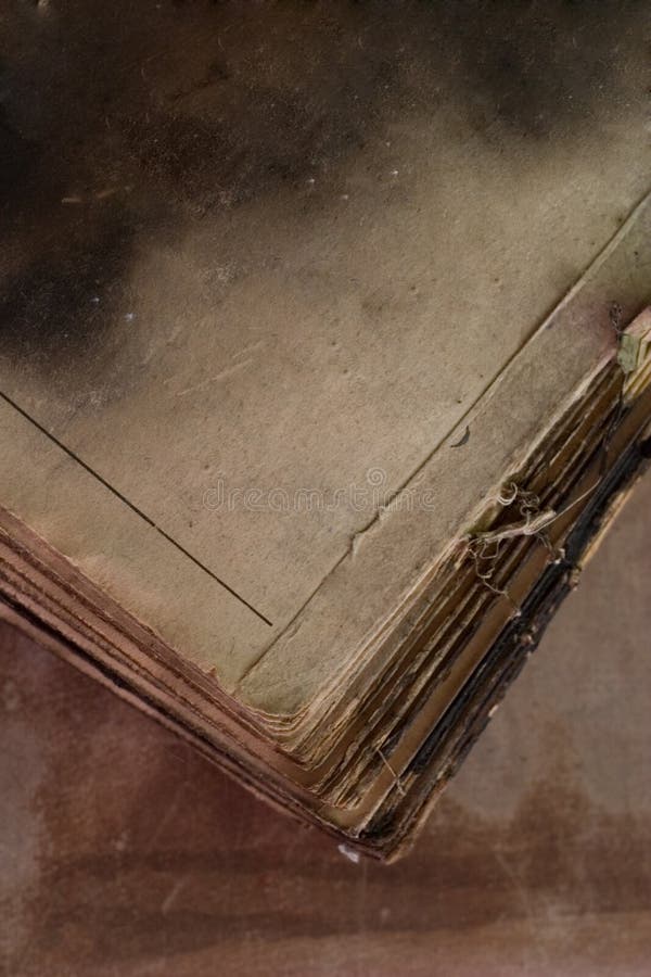 Old Burnt Book with Teared Out Pages on Windowsill Stock Photo - Image ...