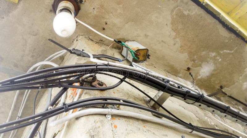 Old cables on wall stock photo. Image of equipment, connection - 218684980