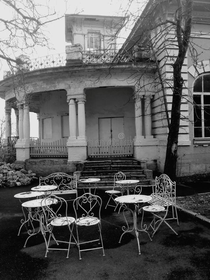 Old cafe in autumn stock image. Image of monochrome - 224615335