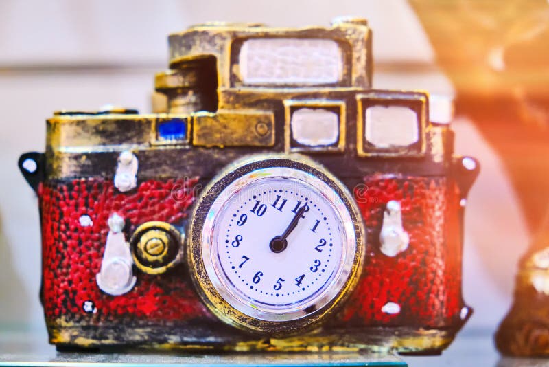 An Old Camera with a Clock is a Concept of a Time Machine. Souvenir ...