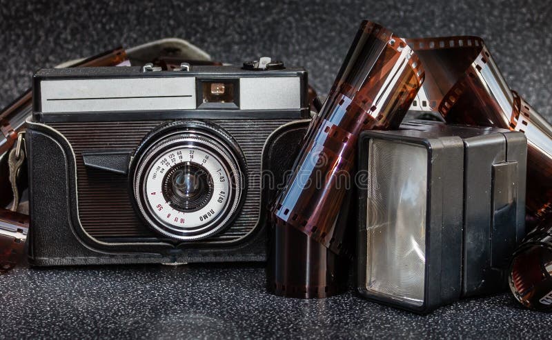 An Old Camera,flash and Film Tape Stock Photo - Image of tapes, object ...