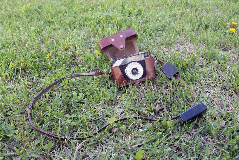 Old Camera on the Green Grass in the Garden Stock Image - Image of ...