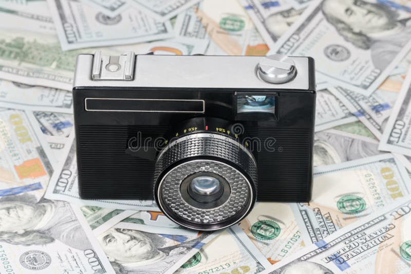 Old camera on money stock image. Image of banknote, format - 92676617