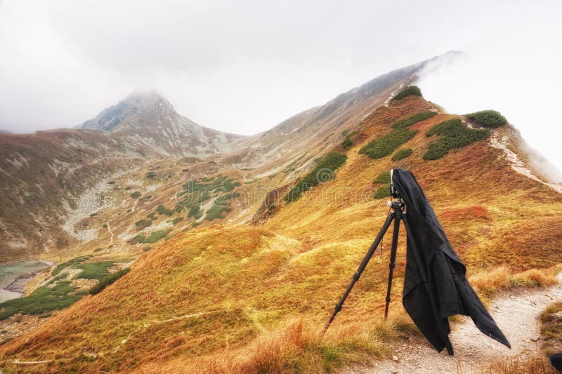 Old camera in mountains stock photo. Image of nature - 21365526