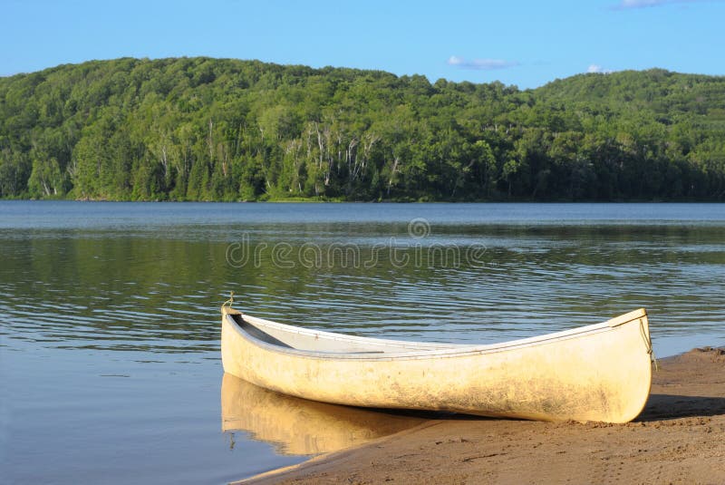 Old canoe at a lake stock photo. Image of lake, arrowhead - 10078520