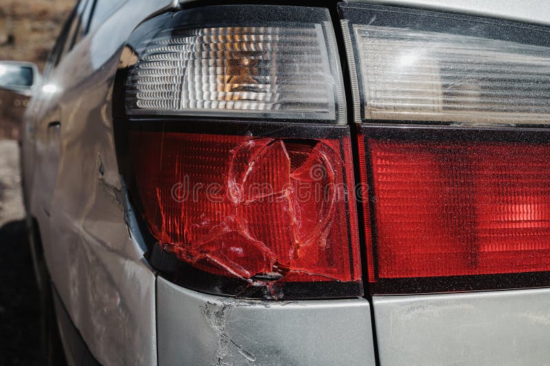Old Car after an Accident with Damaged Broken Taillight Close-up Stock ...