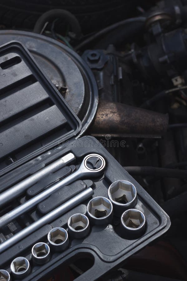 Old Car Engine Repair Tools. Toolbox Under the Opened Car Hood. Stock ...