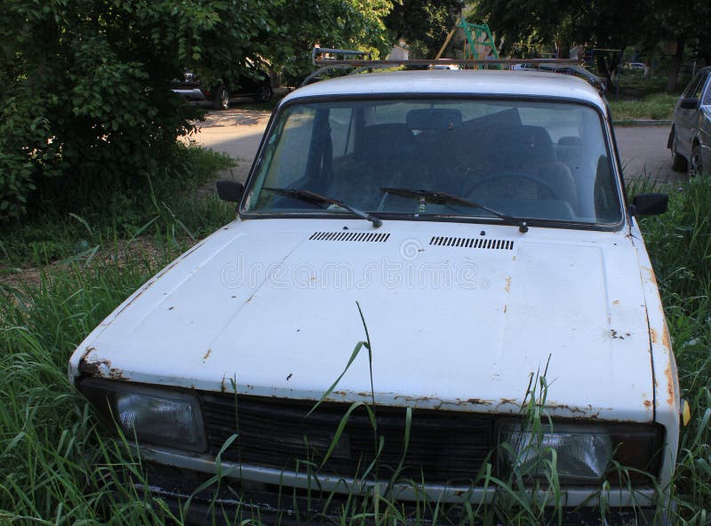 Old Car Painted White with Spots of Rust Stock Photo - Image of bumper ...