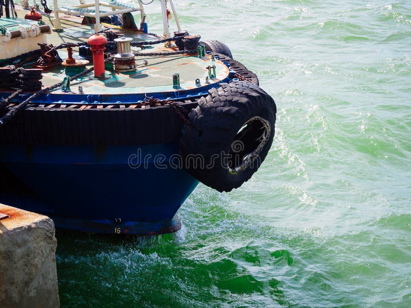 A Car Tire on the Bow of a Ship. the Ship S Shock Absorber. Safety ...