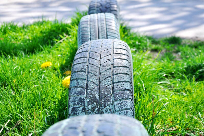 Car tires in the ground editorial stock photo. Image of automobile ...